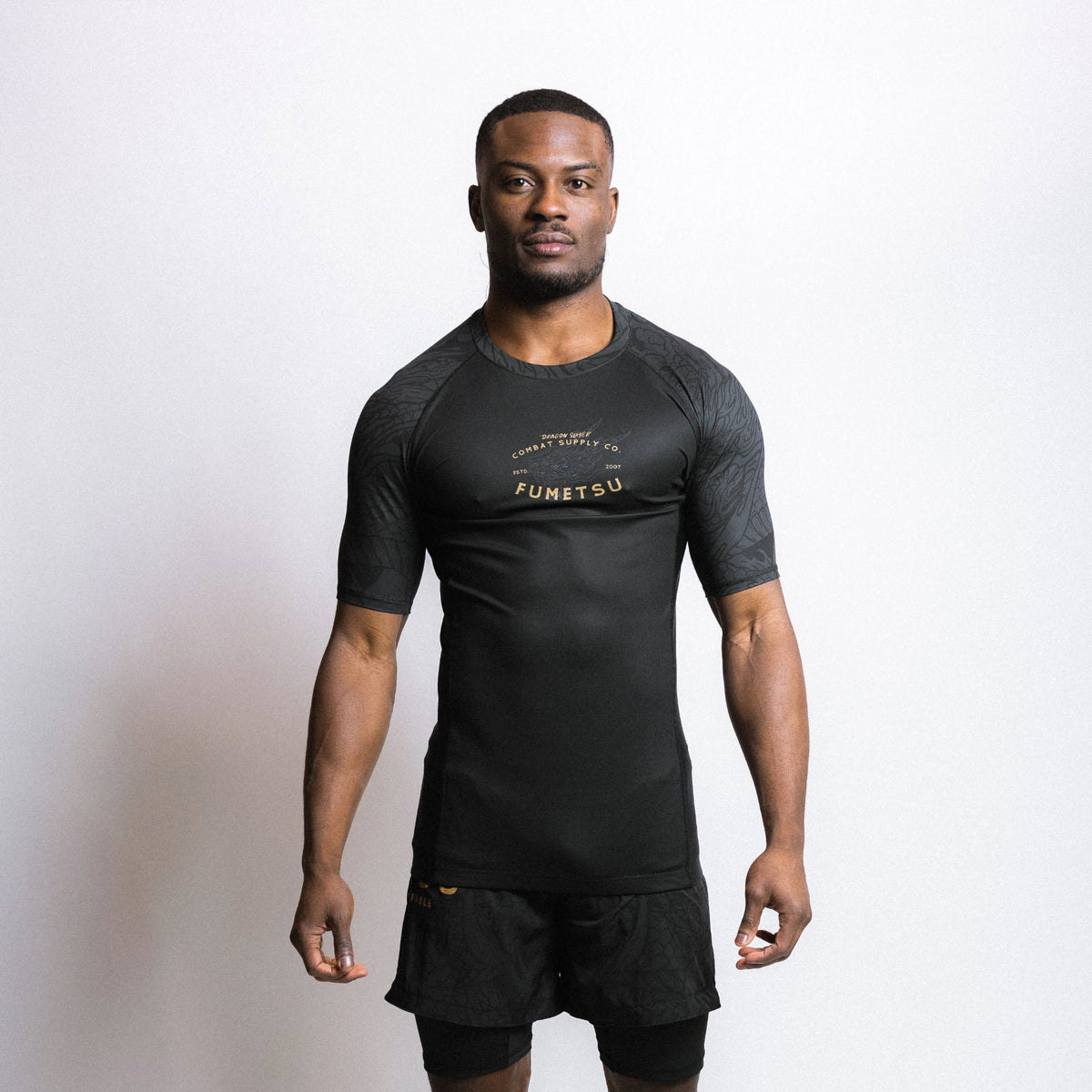 Dragon Slayer Short Sleeve Rash Guard Black/Gold from Fumetsu